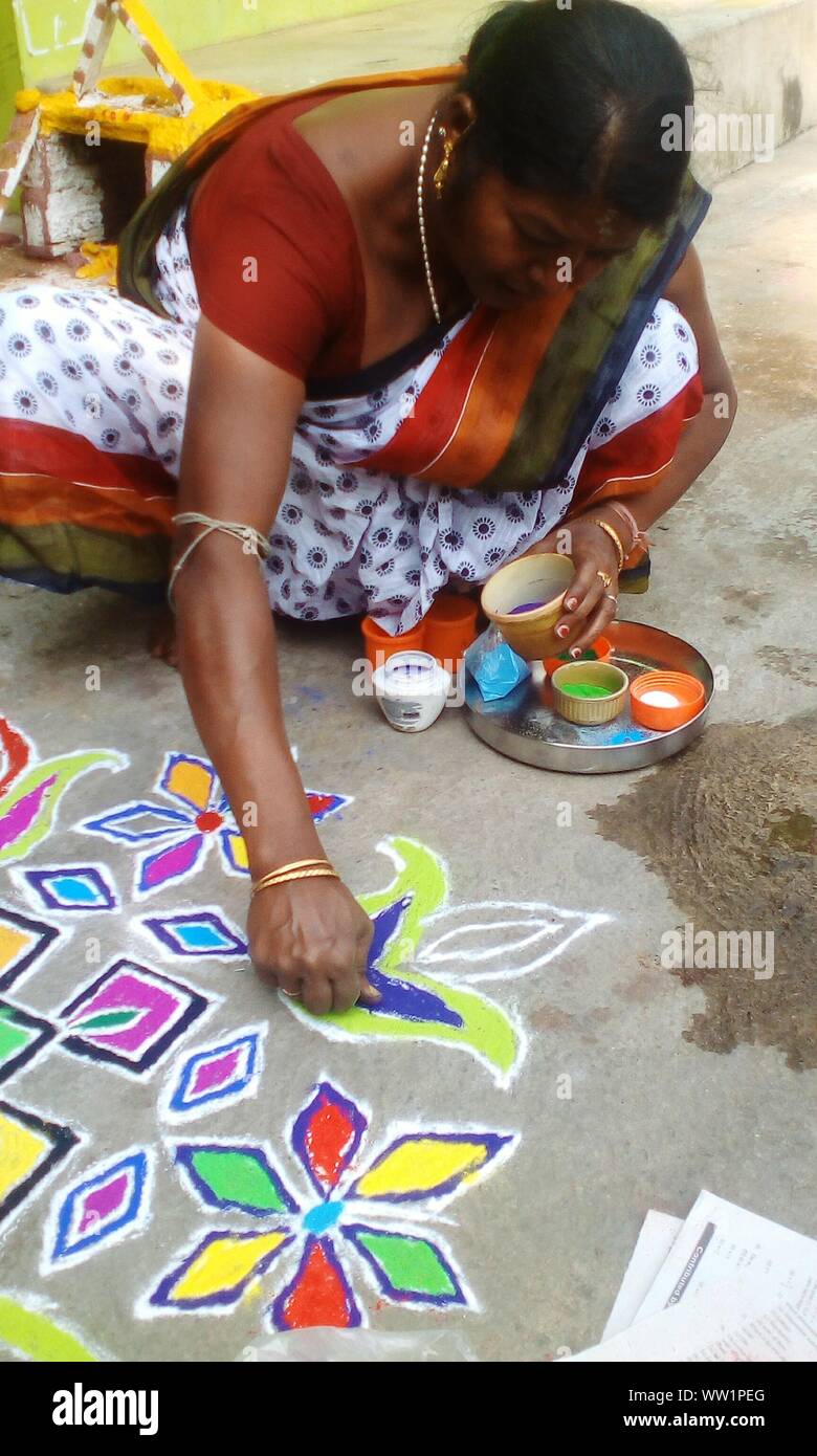 Rangoli woman hi-res stock photography and images - Alamy