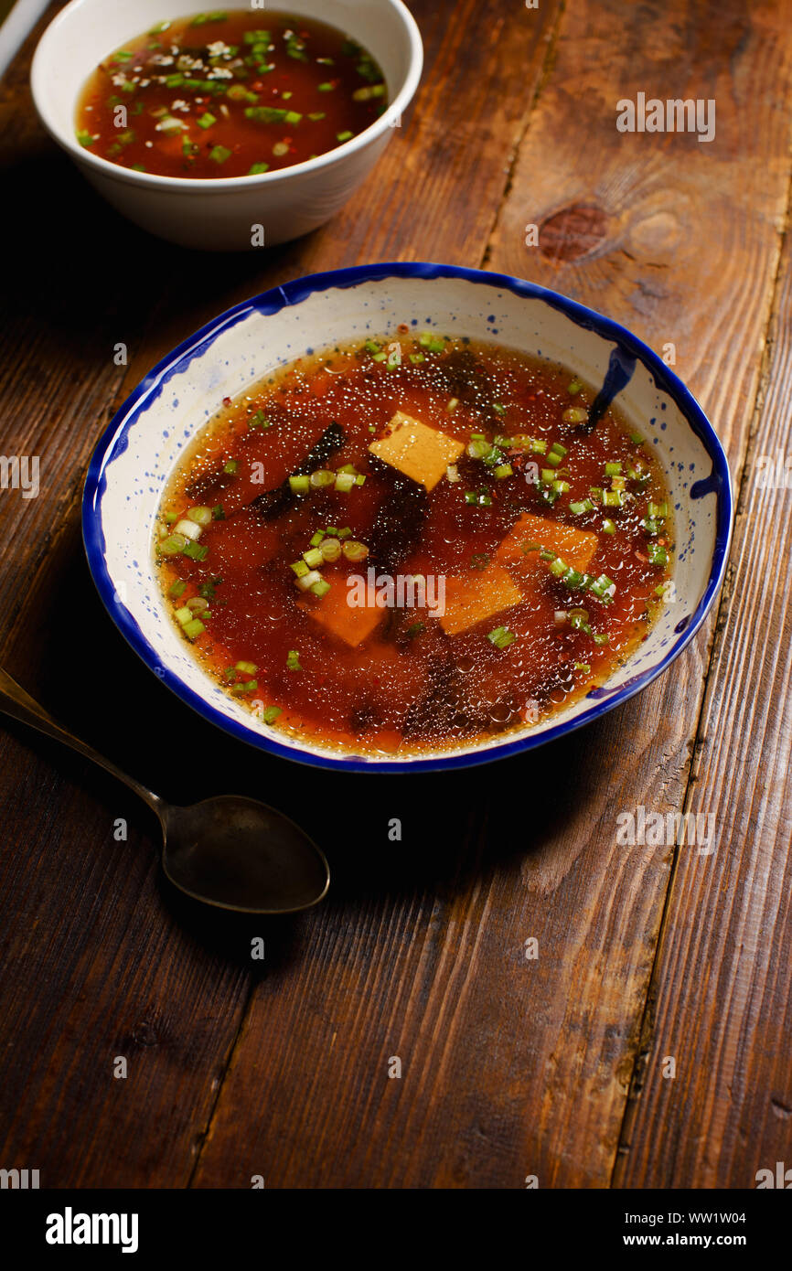 Japanese miso soup with tofu, wakame seaweed, spring onions and pepper flakes Stock Photo - Alamy