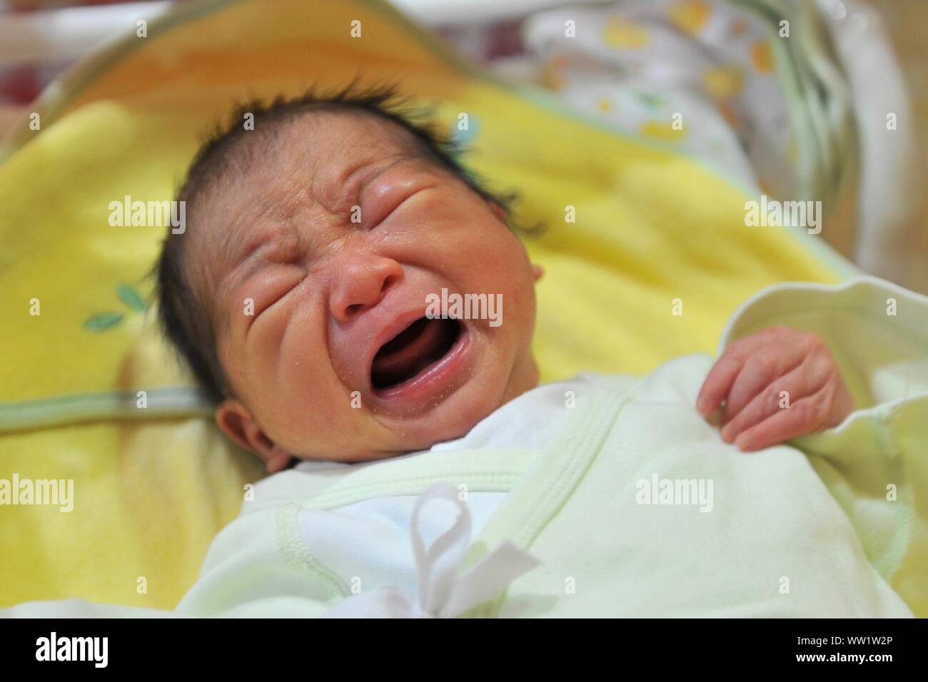 Indian baby crying hi-res stock photography and images - Alamy