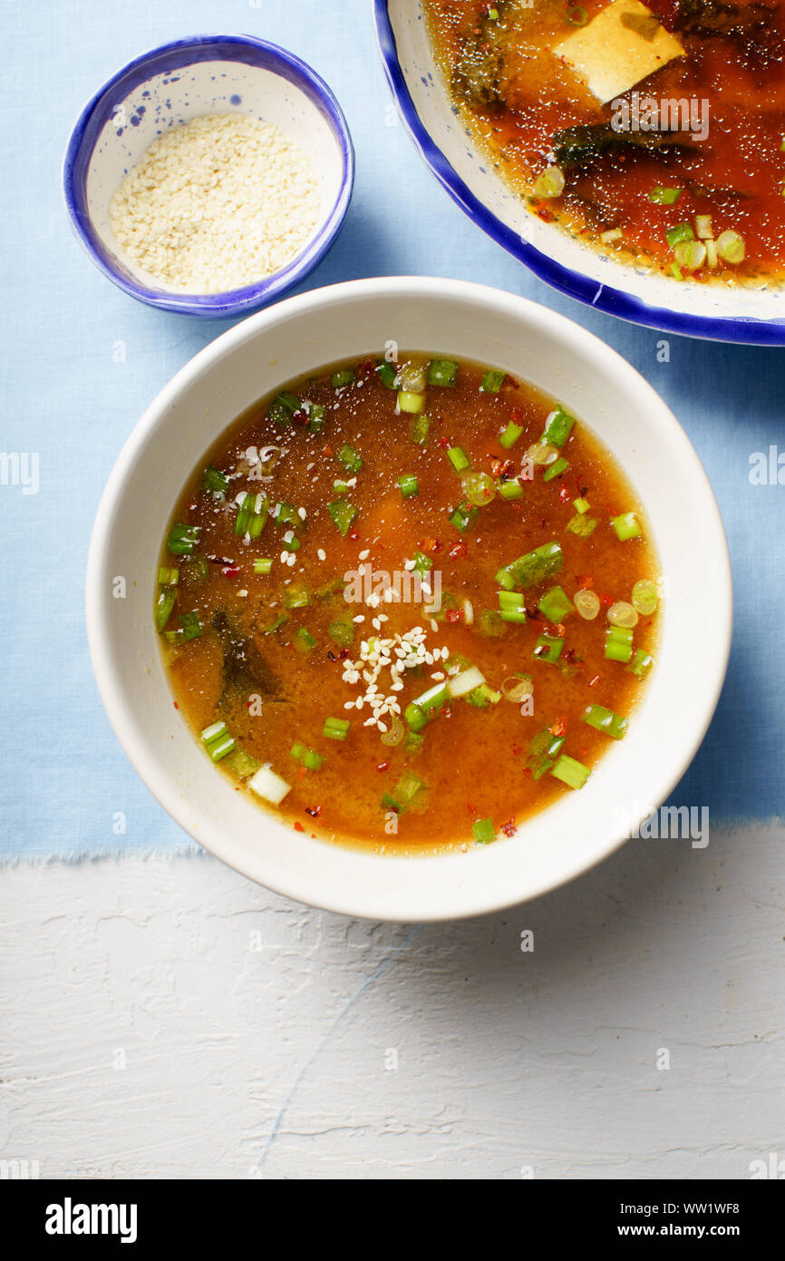 Japanese miso soup with tofu, wakame seaweed, spring onions and pepper flakes Stock Photo - Alamy