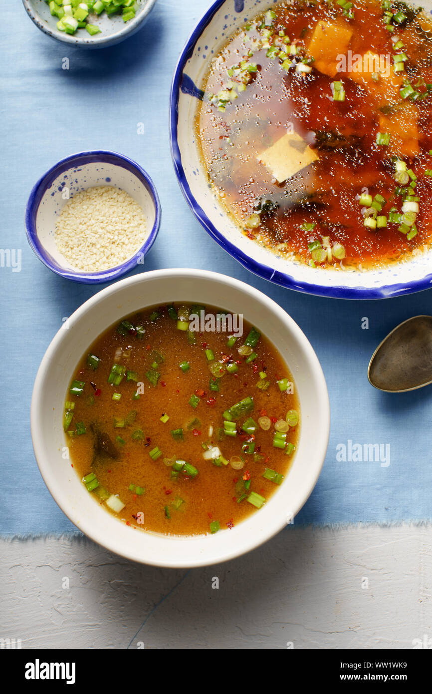 Japanese miso soup with tofu, wakame seaweed, spring onions and pepper flakes Stock Photo - Alamy