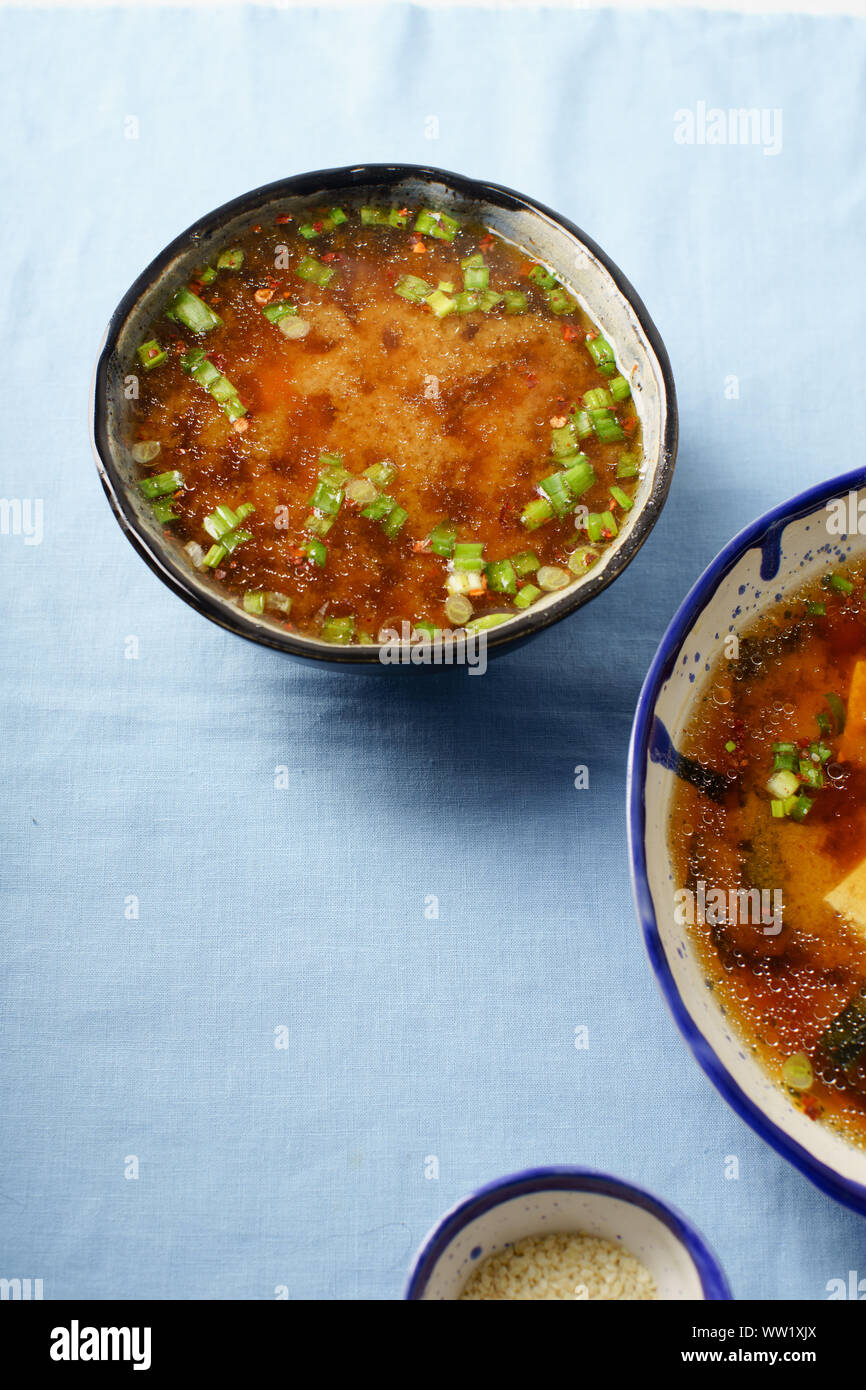 Japanese miso soup with tofu, wakame seaweed, spring onions and pepper flakes Stock Photo - Alamy
