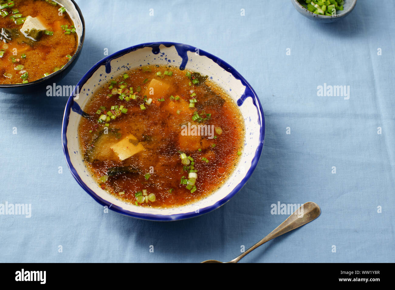 Japanese miso soup with tofu, wakame seaweed, spring onions and pepper flakes Stock Photo - Alamy