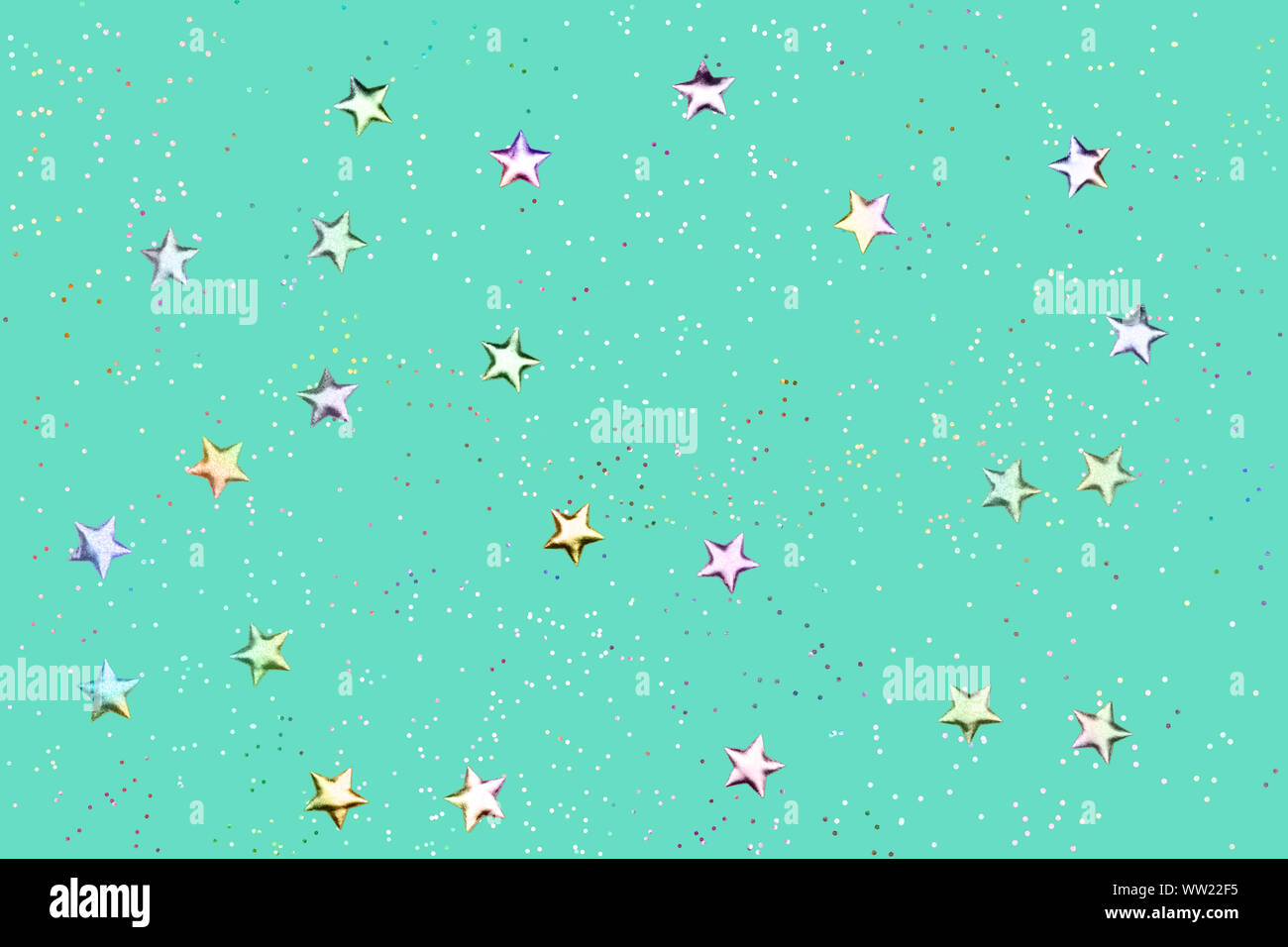 Green mint background with holographic glitter and metallic stars. Flat ...