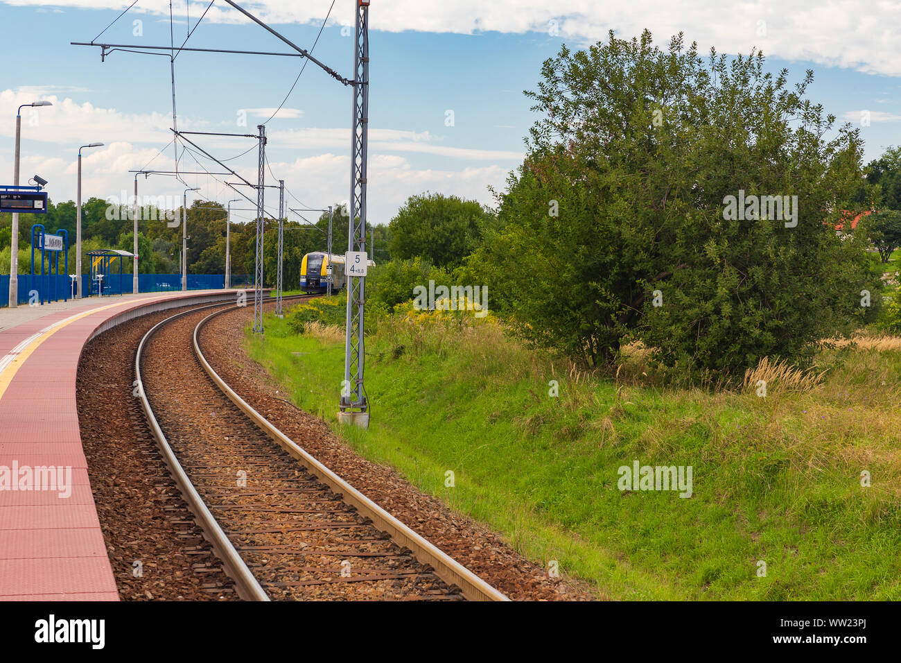 Train approaching one of the stations Stock Photo - Alamy