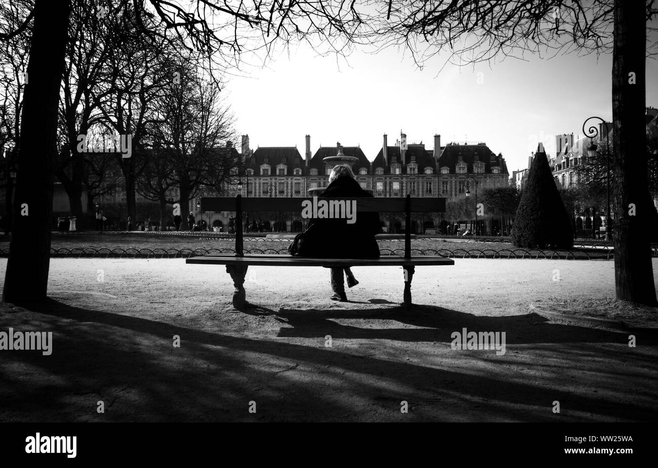 Sitting alone on bench hi-res stock photography and images - Alamy
