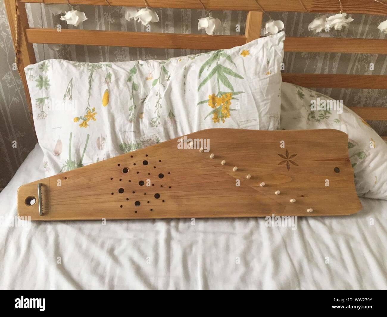 Musical instrument on bed hi-res stock photography and images - Alamy