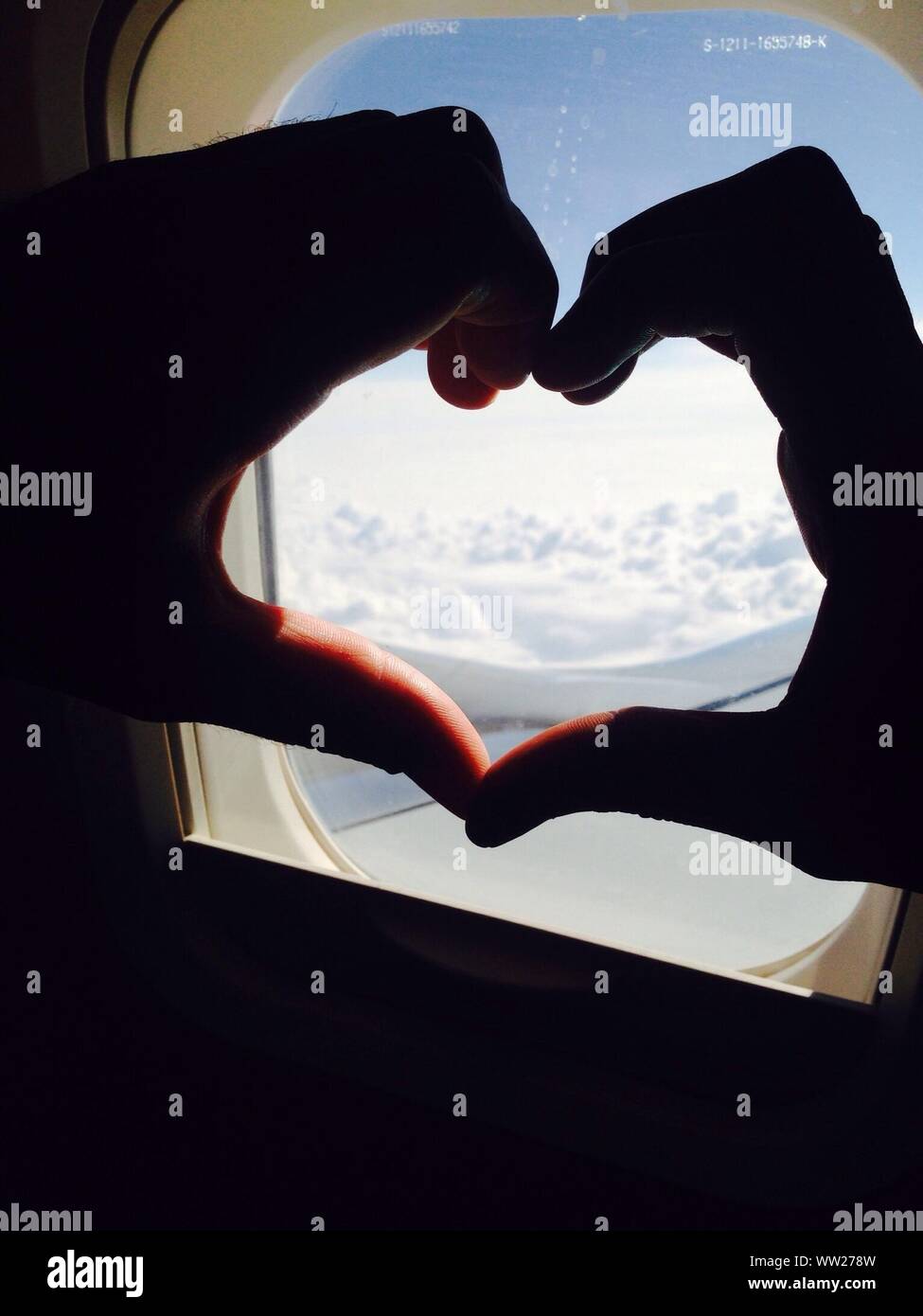 Love heart in sky airplane hi-res stock photography and images - Alamy