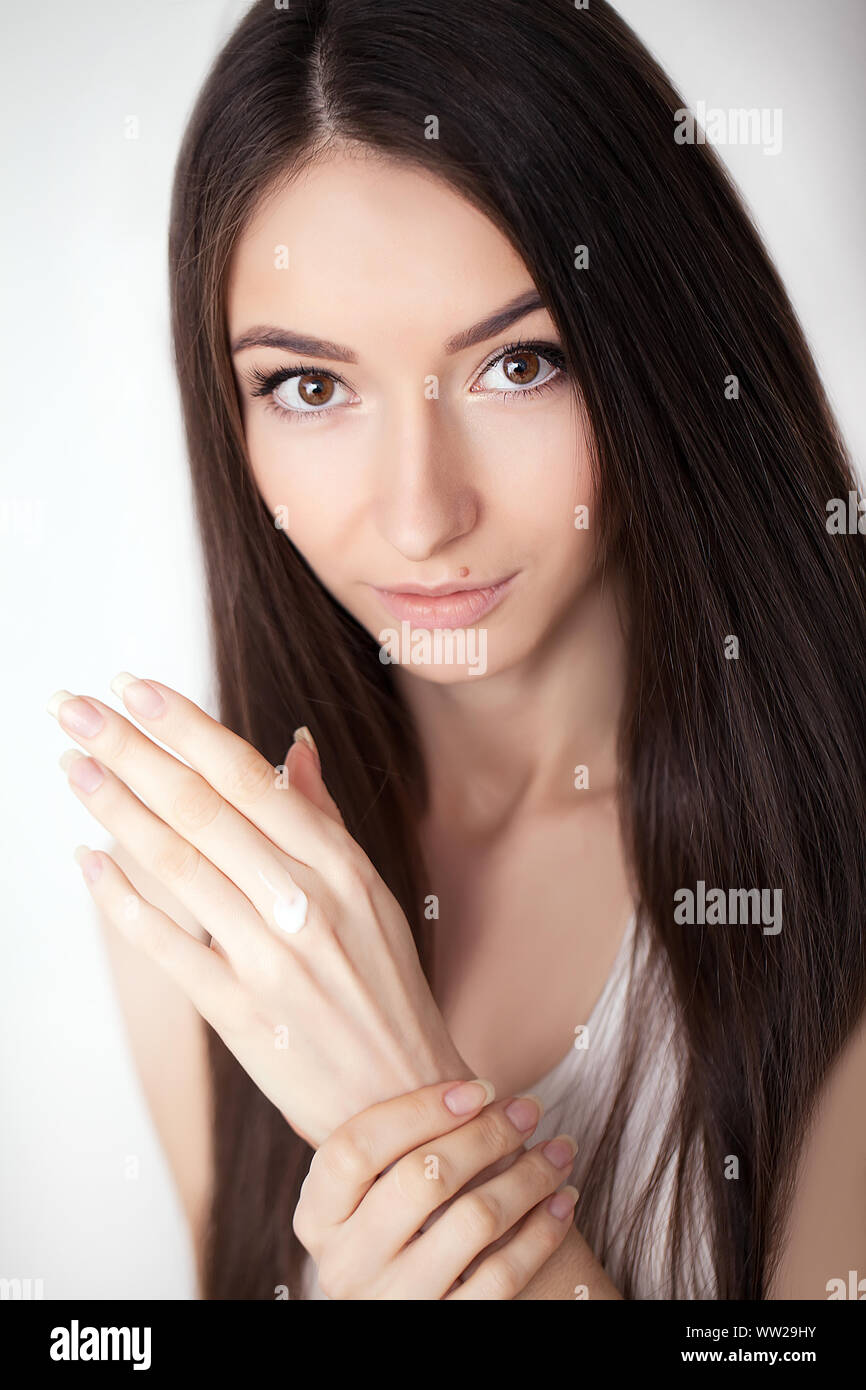 Portrait of beautiful smiling Asian woman with elegant hairstyle and ...