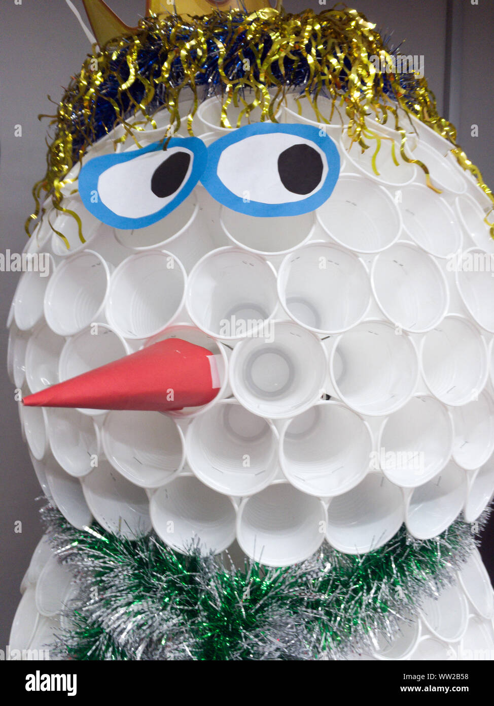 Snowman made of disposable plastic cups Stock Photo - Alamy