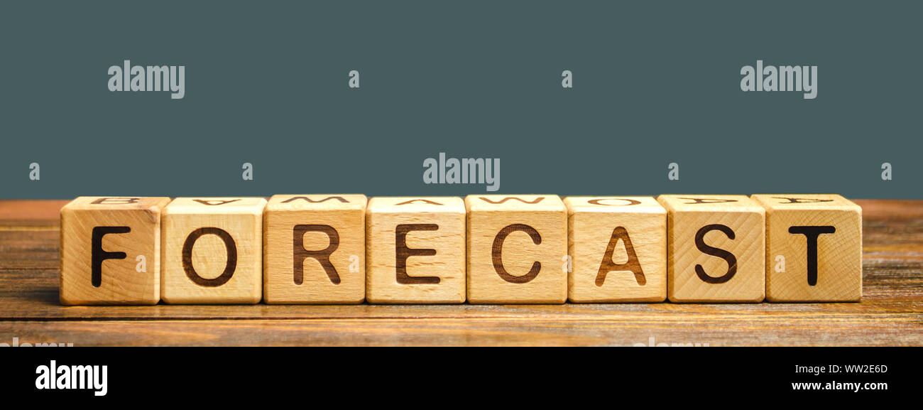 Wooden blocks with the word Forecast. Budgeting the company for the ...