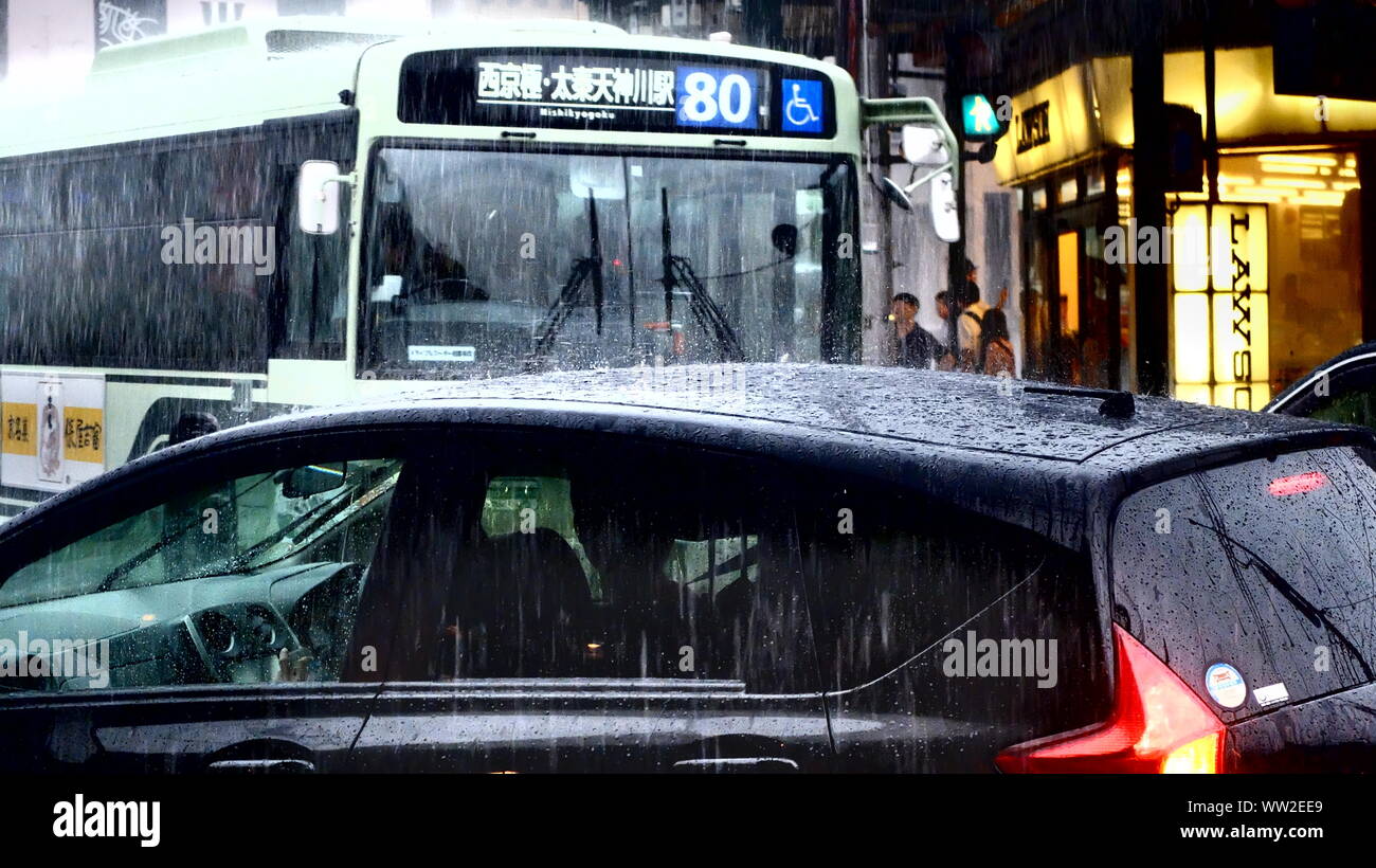 rain on vehicles in Osaka Stock Photo - Alamy