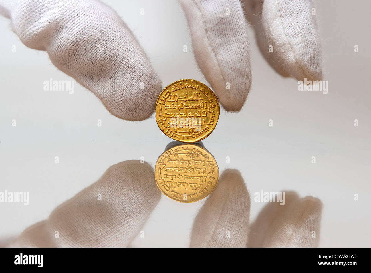 A member of staff at Morton & Eden holds an extremely rare early ...