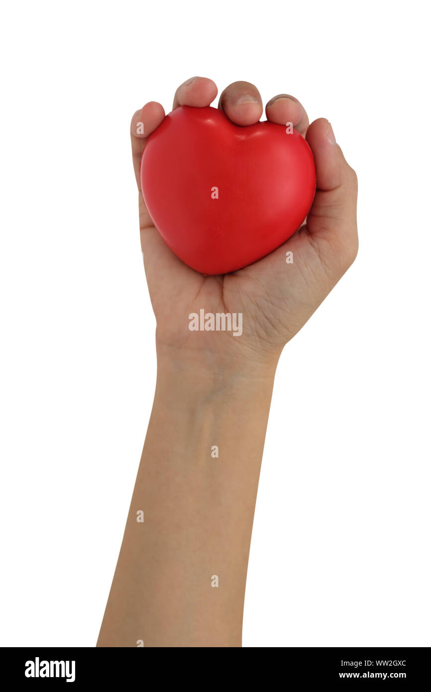 Hand holding a red heart and raising above isolated on the white ...