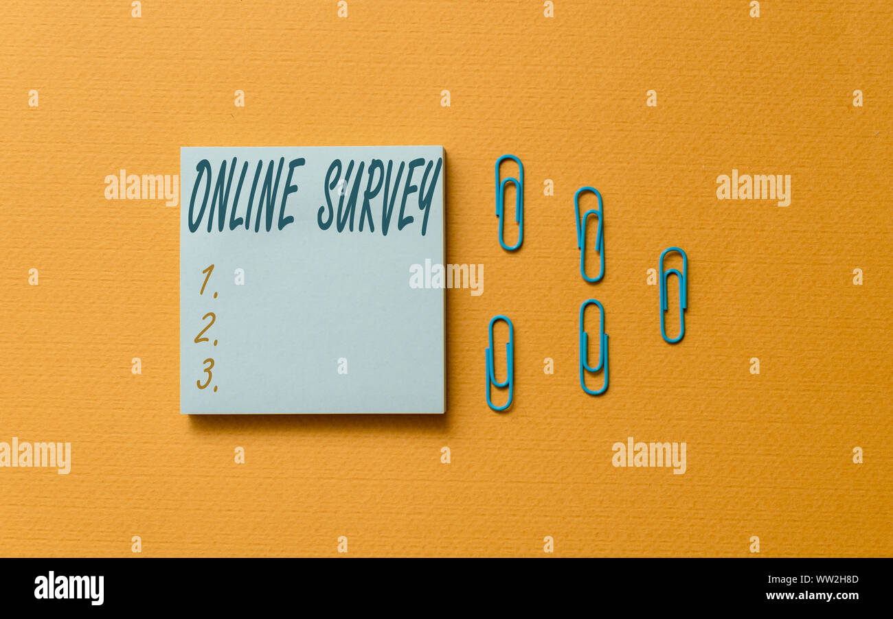 Writing note showing Online Survey. Business concept for Reappraisal ...