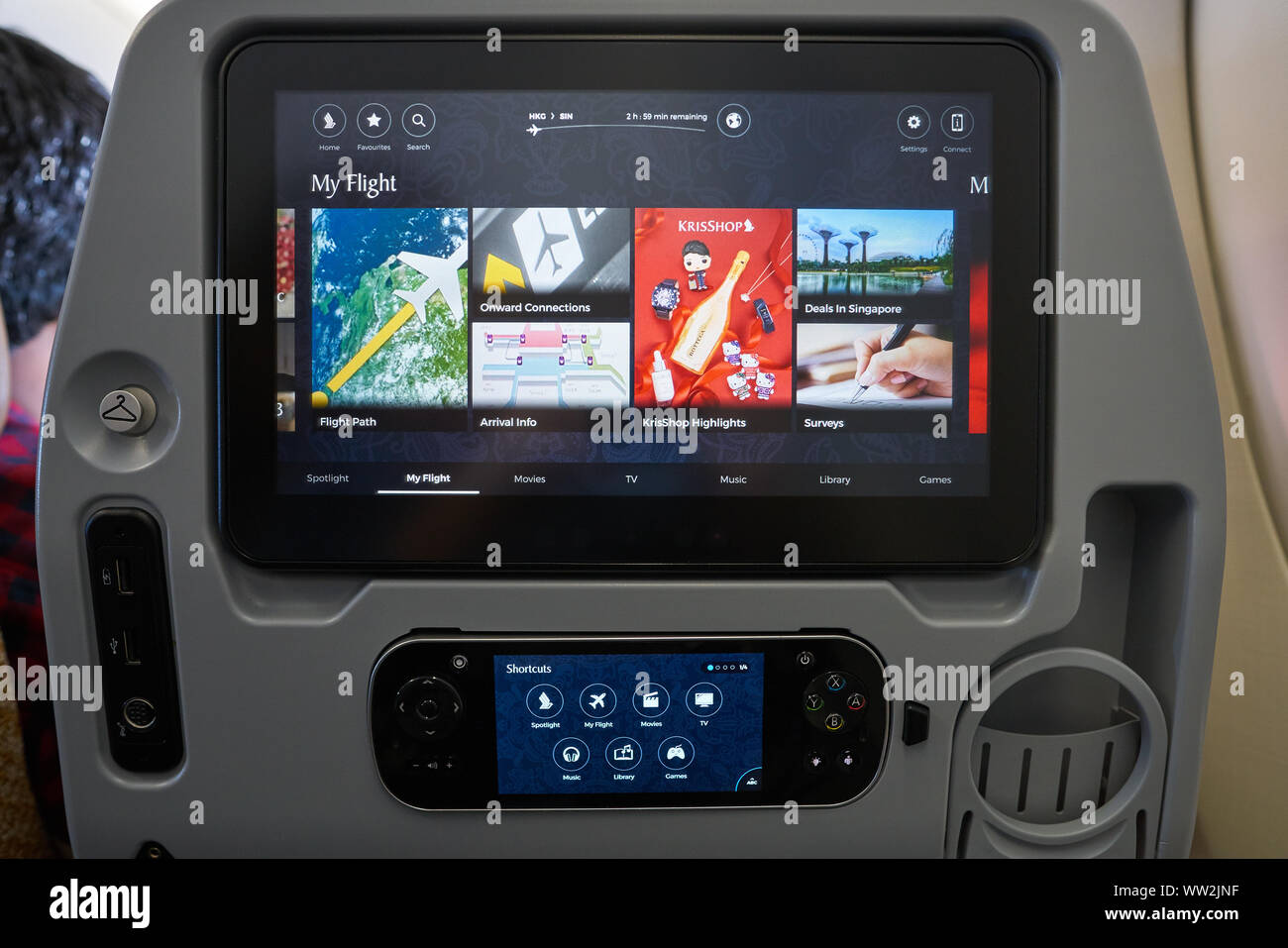 HONG KONG - CIRCA APRIL, 2019: seat back screen in economy class on ...