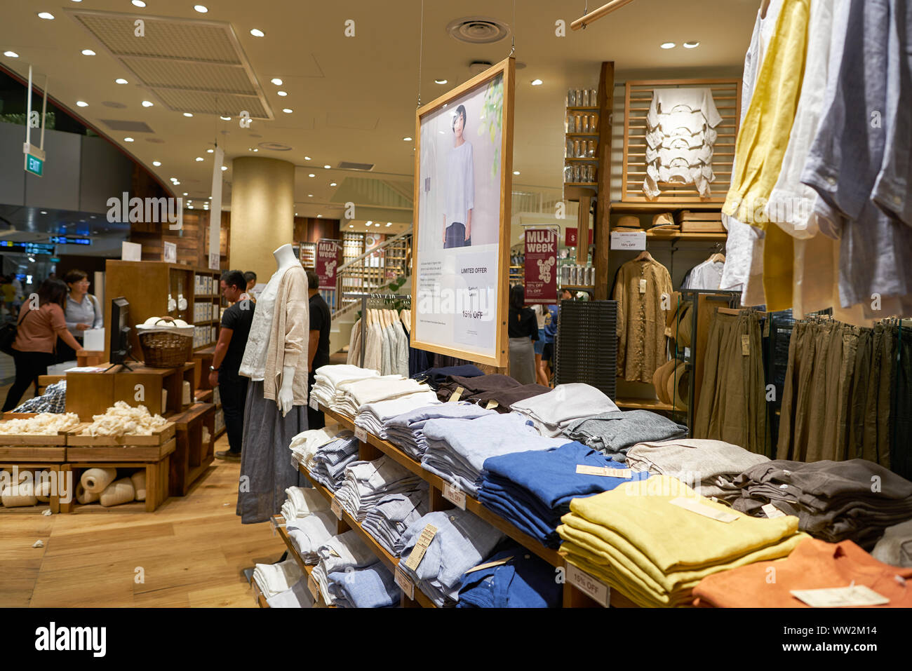 SINGAPORE - CIRCA APRIL, 2019: clothes on display at Muji store in ...