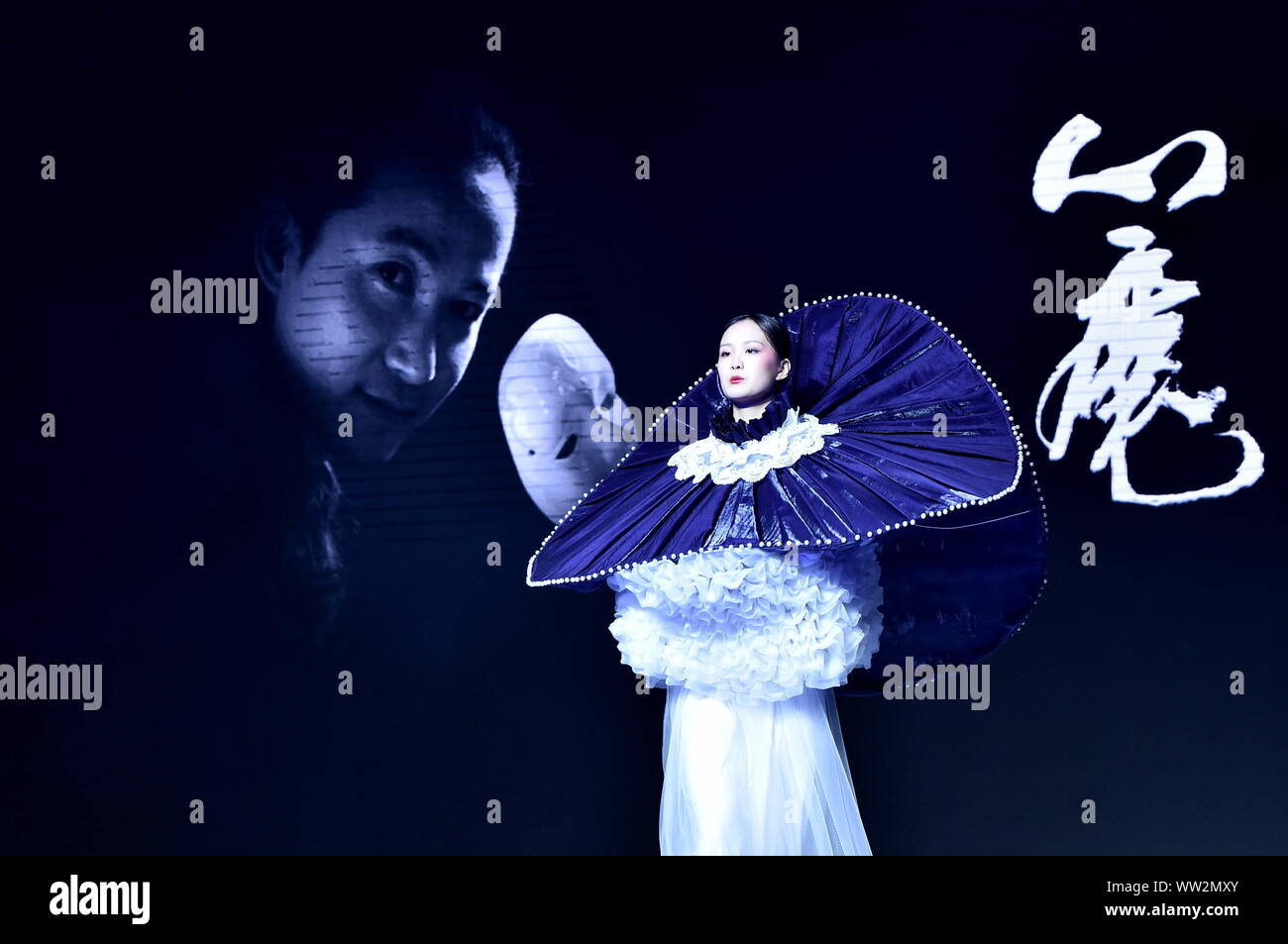 A model shows a new creation by Chinese designer Yao Feng during his ...