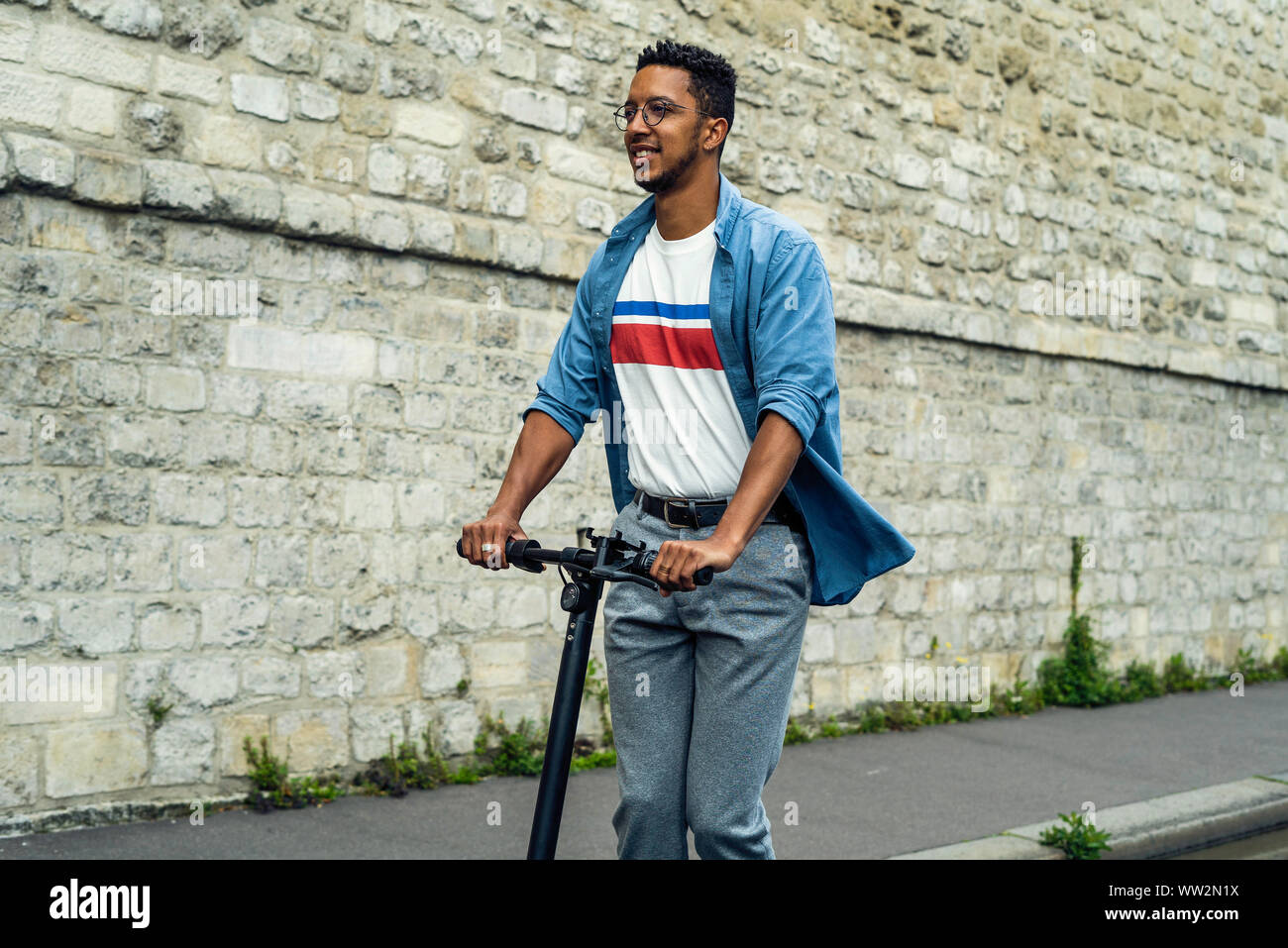 Young man e scooter hi-res stock photography and images - Alamy