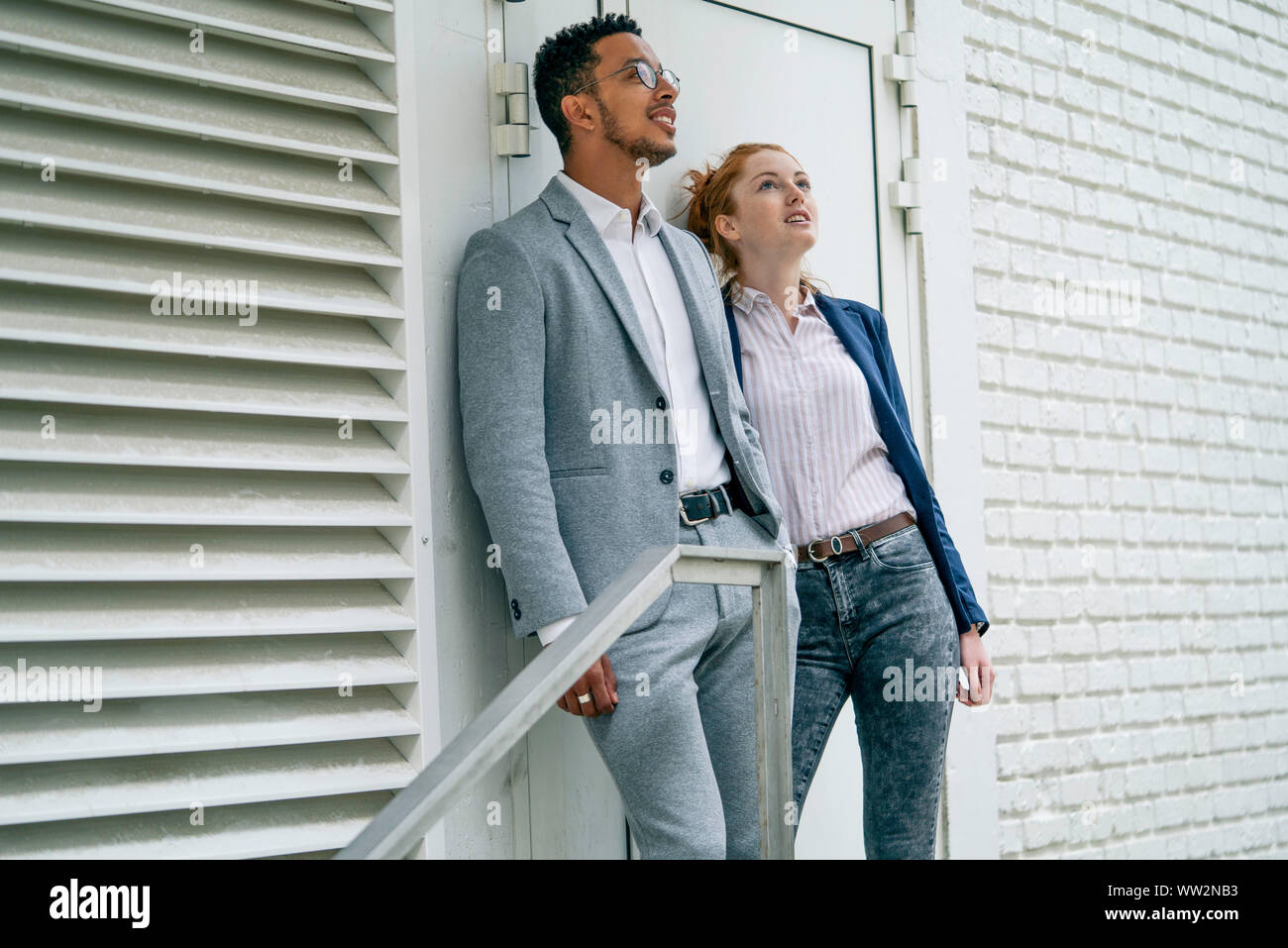 Man leaning railings hi-res stock photography and images - Alamy