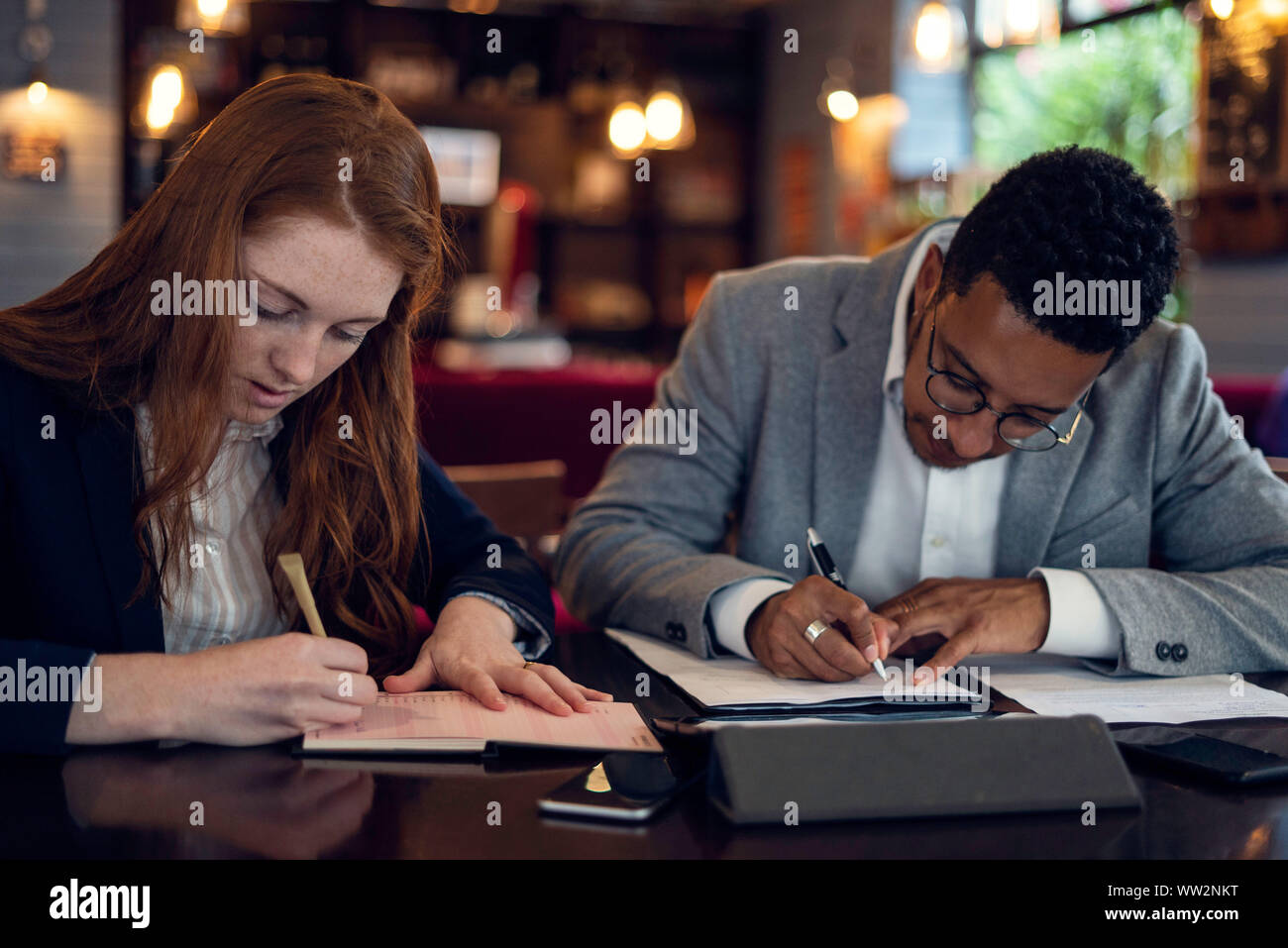 Front view working couple hi-res stock photography and images - Alamy