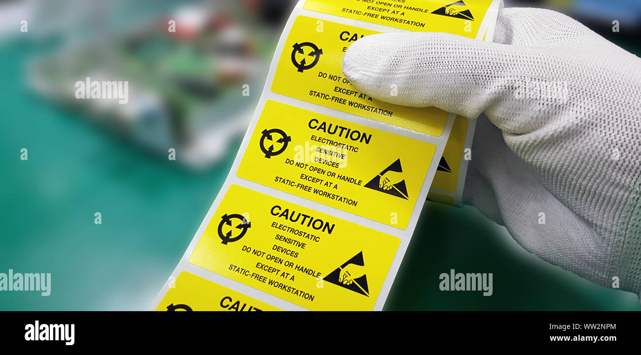 Yellow caution label in electronic industry,CAUTION Electrostatic ...