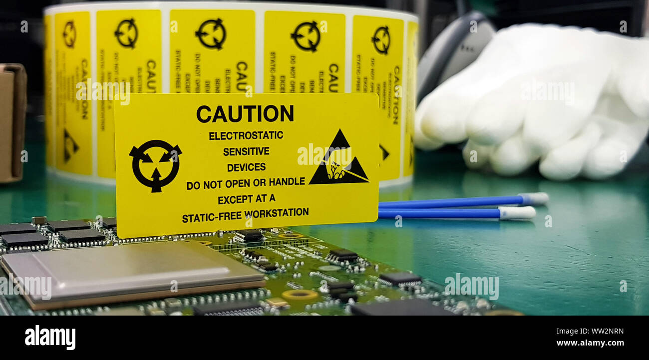 The yellow CAUTION label for Electrostatic Sensitive Devices (ESD) on ...