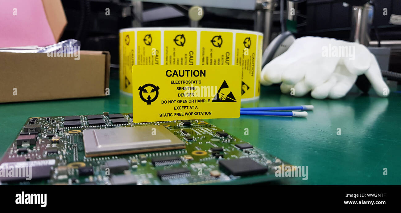 The yellow CAUTION label for Electrostatic Sensitive Devices (ESD) on ...
