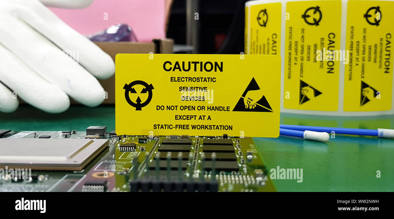 The yellow CAUTION label for Electrostatic Sensitive Devices (ESD) on ...