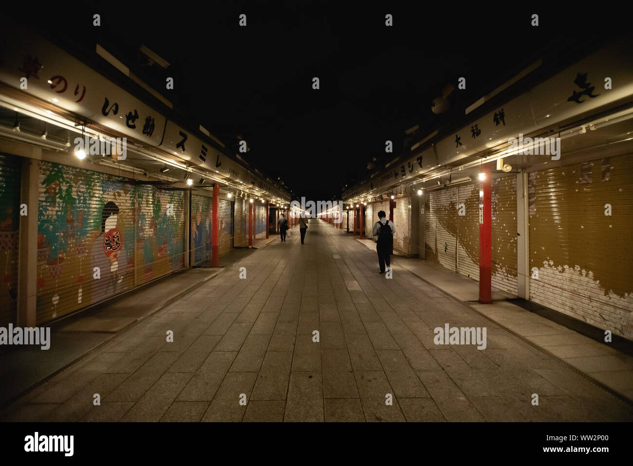 Closed shops at night Stock Photo - Alamy