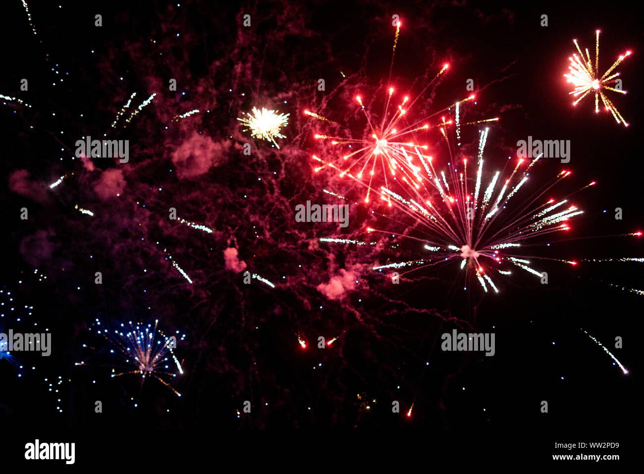 Fireworks display in sky Stock Photo - Alamy