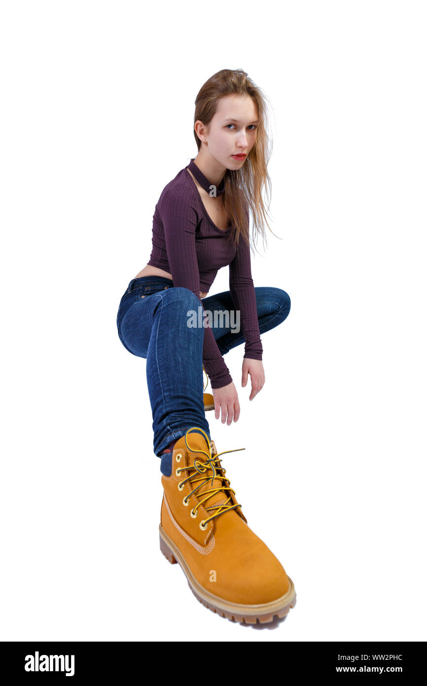 Front view of a woman in boots. girl watching. Rear view people ...