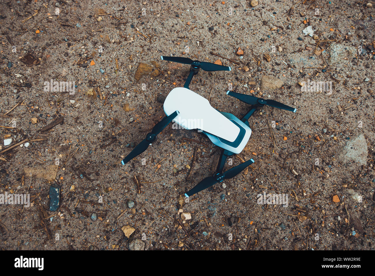 small drone lying on the ground Stock Photo - Alamy