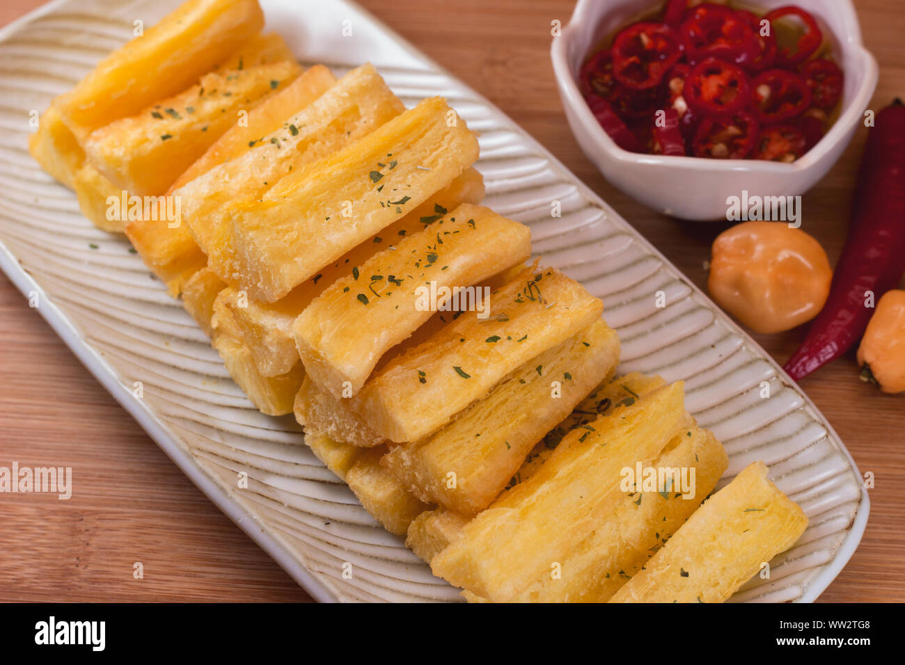 Deep fried cassava root. Brazilian food mandioca frita Stock Photo - Alamy