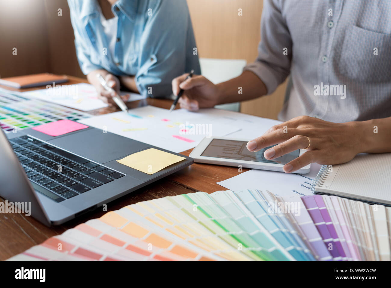 Creative UI designer teamwork meeting planning designing wireframe ...