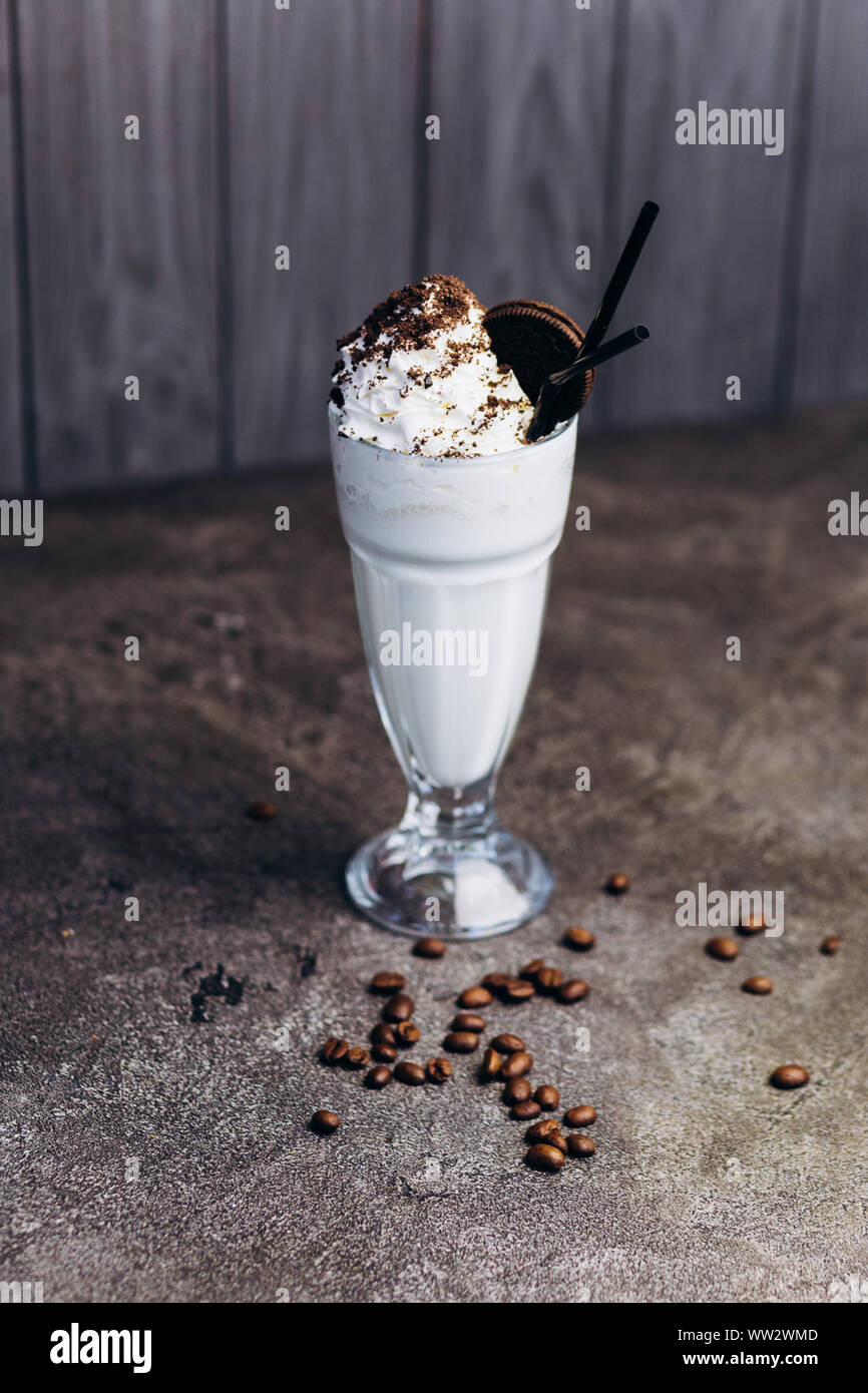 Delicious cold milkshake with cocoa and chocolate in a glass Stock ...