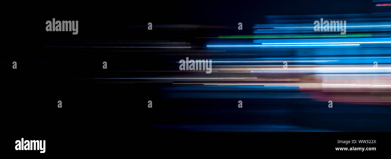 Abstract motion light trails on the dark background Stock Photo - Alamy