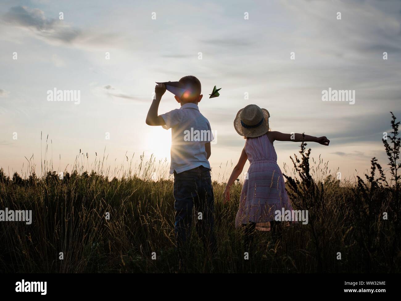 Sister And Brother Sunset High Resolution Stock Photography and Images ...