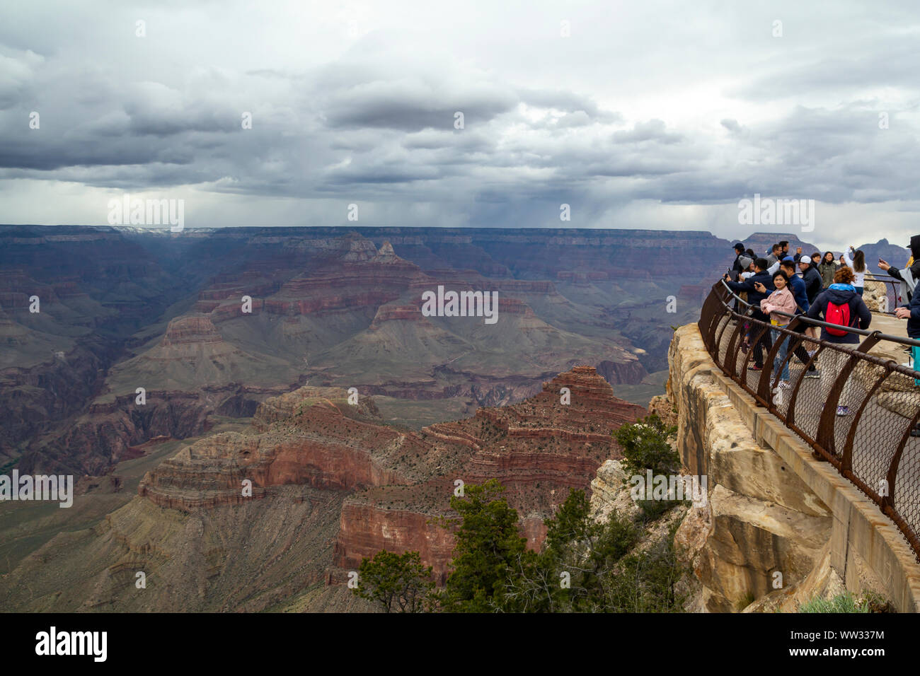 People at a scenic lookout with great views in the Grand Canyon ...