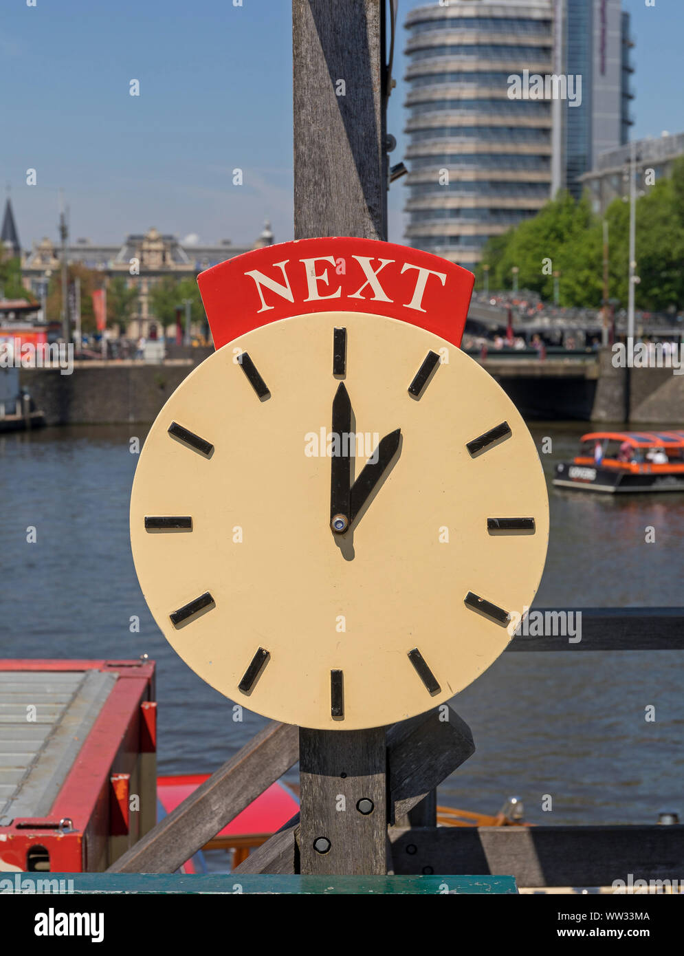 Big Round Analog Clock With Next Time Stock Photo - Alamy