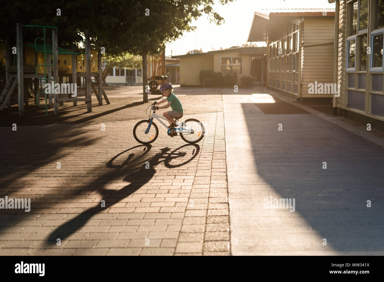Blonde riding a bicycle hi-res stock photography and images - Alamy