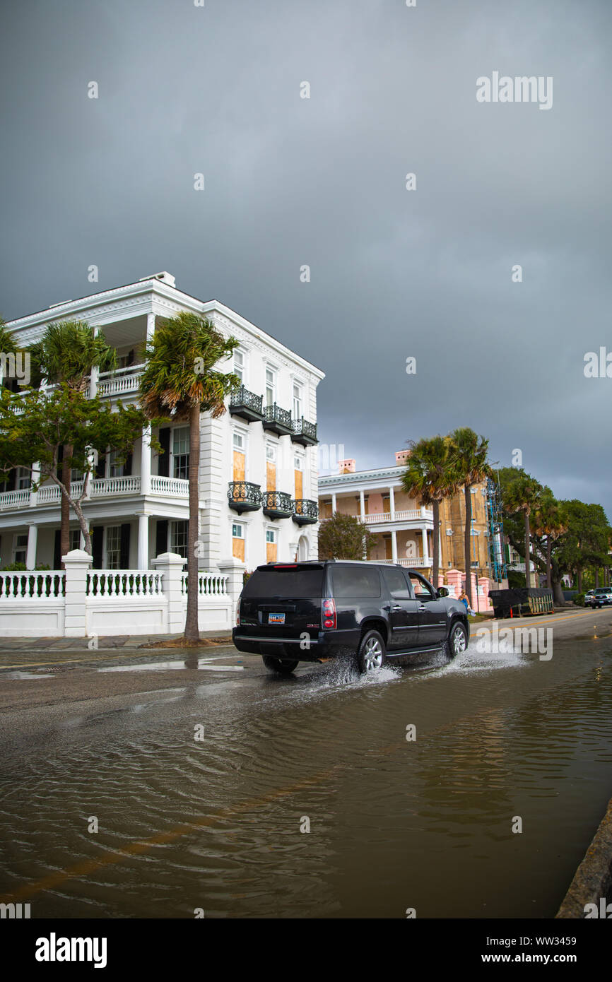 An SUV drives through flood water as Hurricane Dorian approaches Stock ...