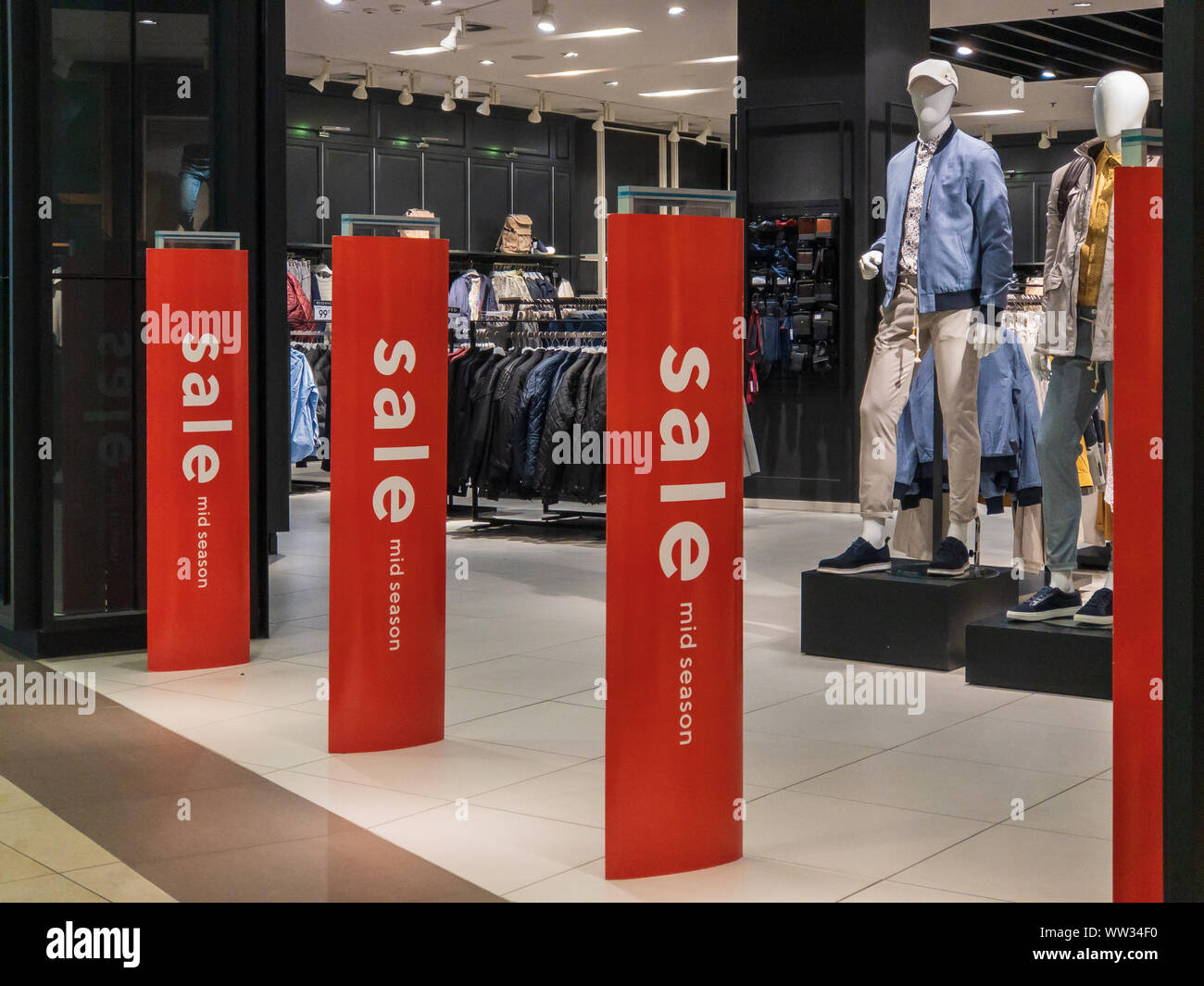 Mid season sale banner at the clothing store Stock Photo - Alamy
