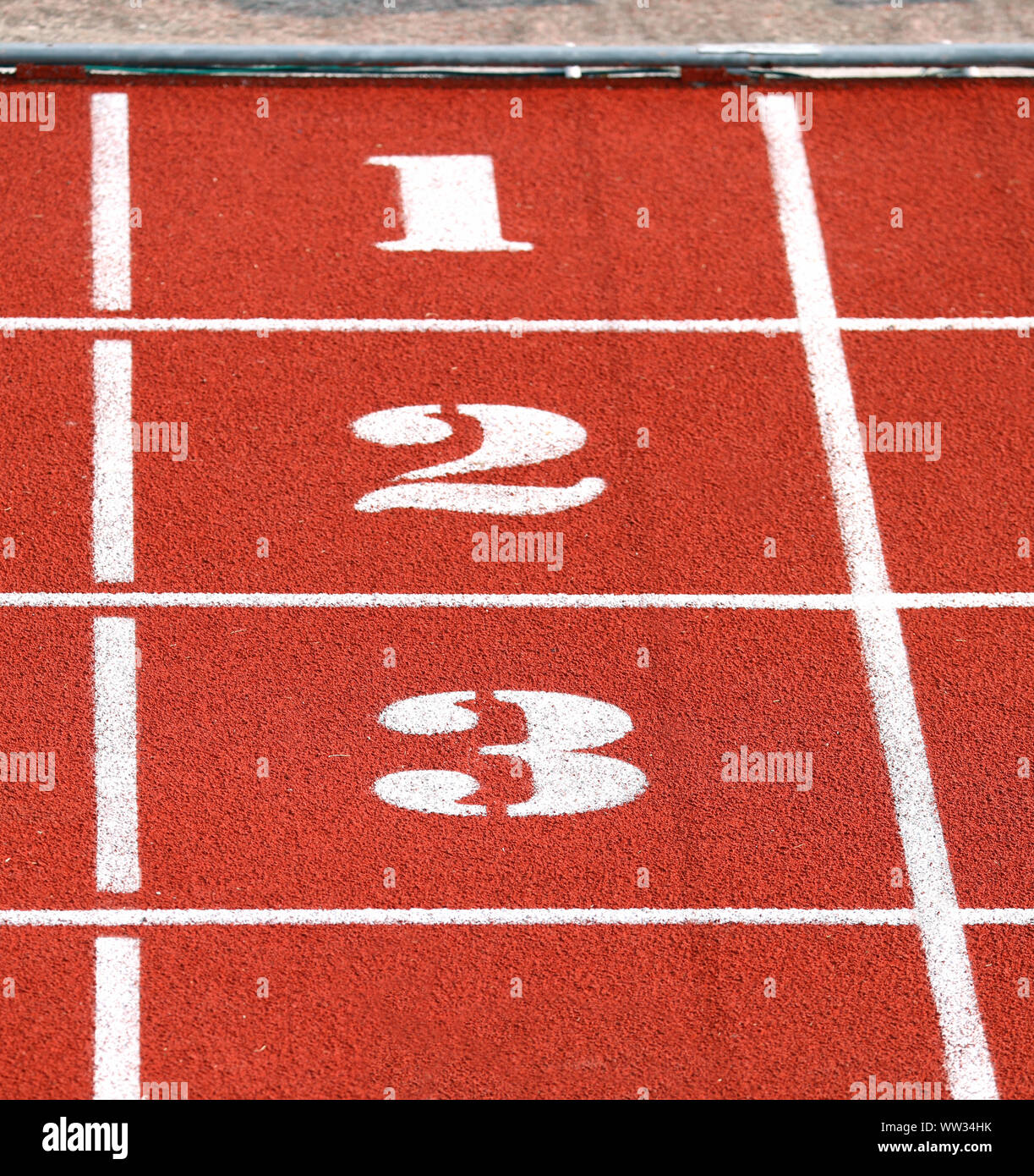 Finish line with numbers 1 2 3 on sport venue Stock Photo - Alamy