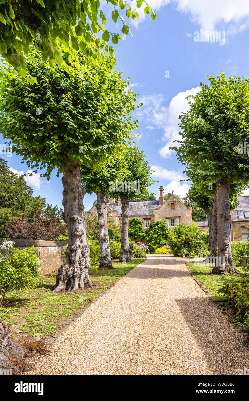The entrance drive to Stanton Court in the Cotswold village of Stanton ...