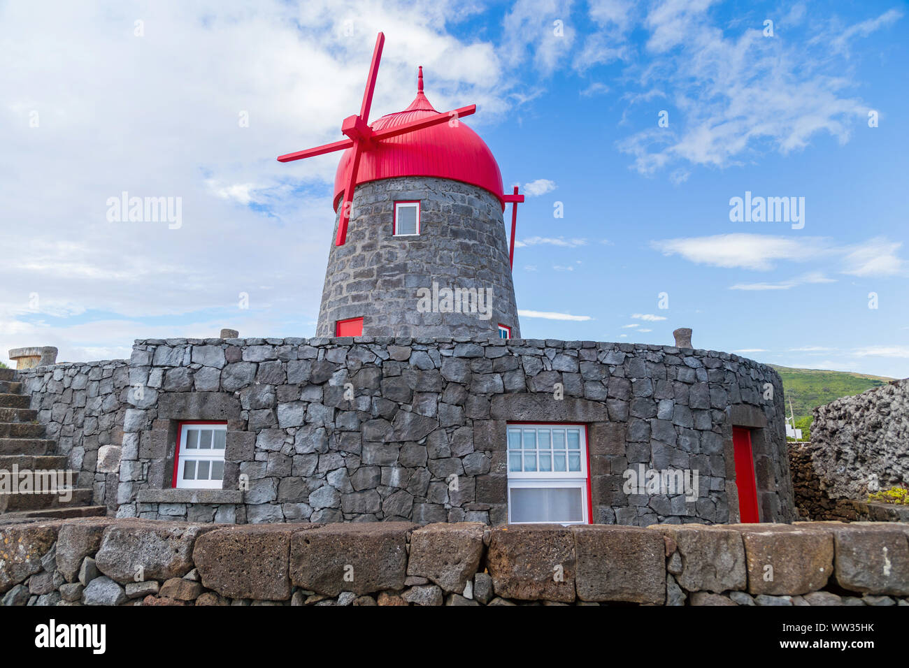 A traditional windmill on Vila da Praia, Graciosa Island, Azores ...