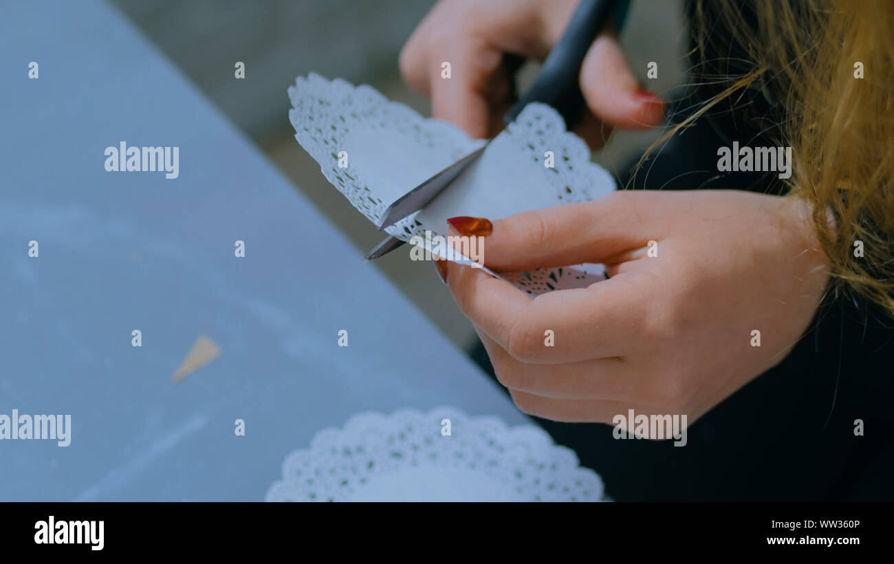 Cutting paper hi-res stock photography and images - Alamy