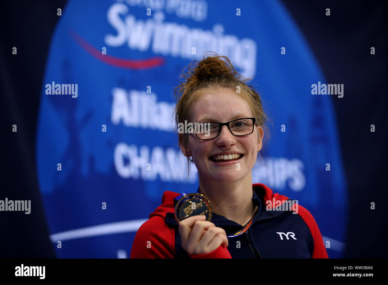 Great Britain's Rebecca Redfern poses with her gold medal after winning ...