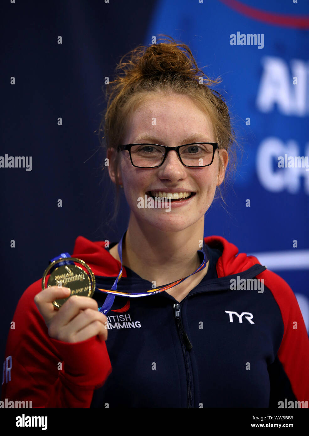 Great Britain's Rebecca Redfern poses with her gold medal after winning ...