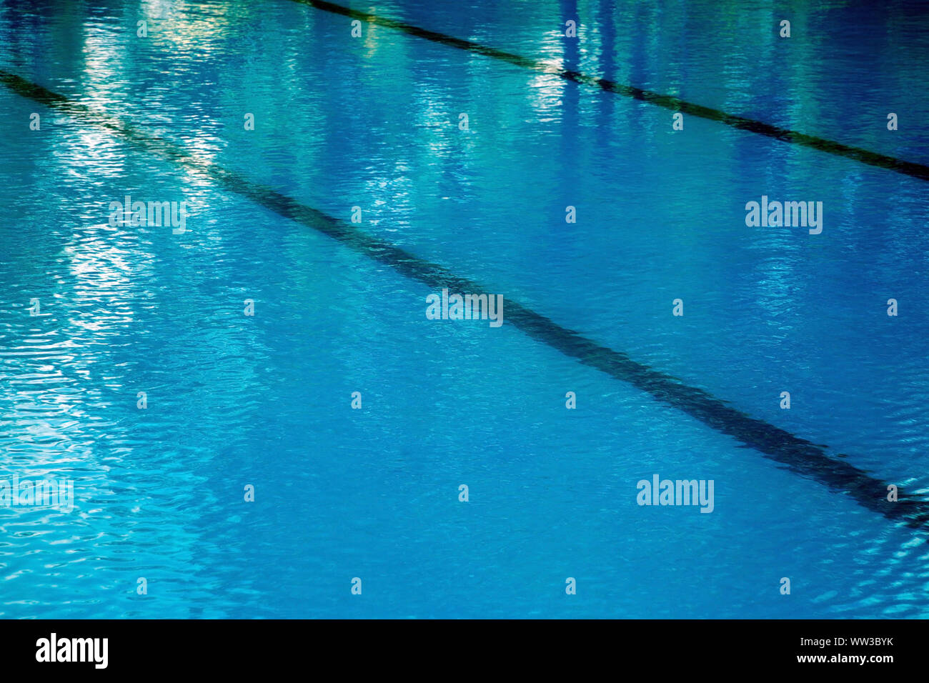Outdoor swimming pool with clear blue water Stock Photo - Alamy